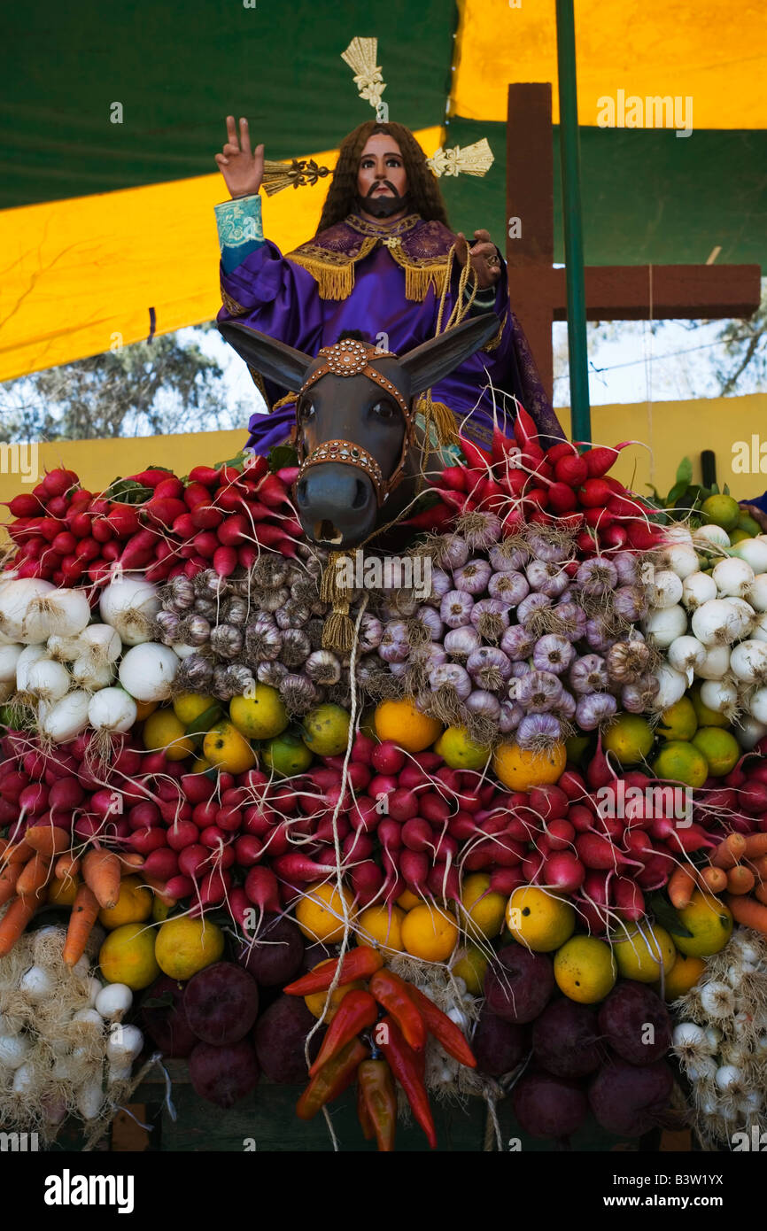 Statue of Christ decorated with fruit and vegetables during Easter Palm ...