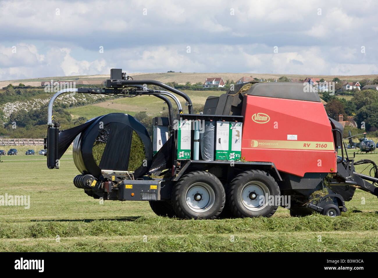 Vicon RV 2160 variable chamber baler in use at Shoreham Airport, West ...
