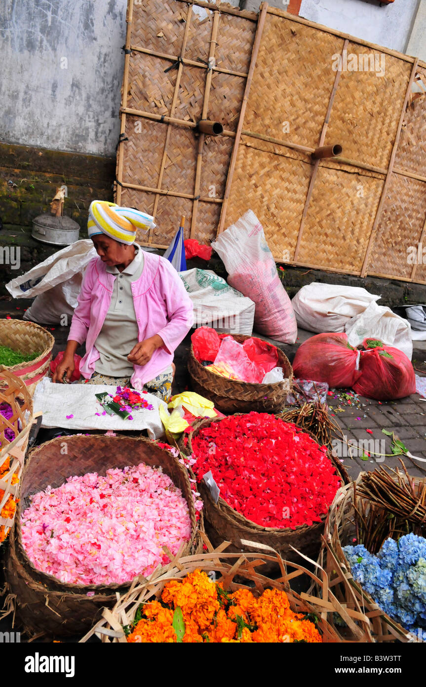 old balinese lady selling flowers for offerings and rituals , ubud ...