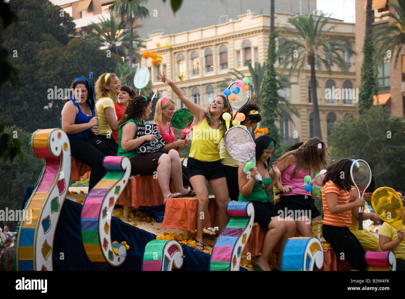 Spanish woman in costume on a float during the Battle of Flowers or ...