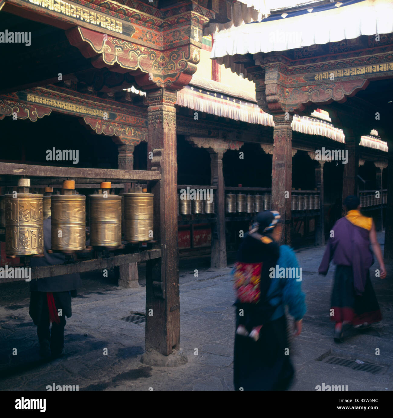 Tibet Lhasa Barkhor square Jokhang temple Tibetan pilgrims spinning ...