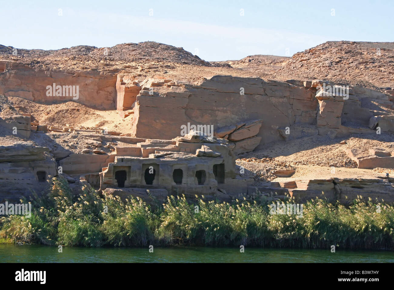 Egypt: rock caves at the Nile Stock Photo - Alamy