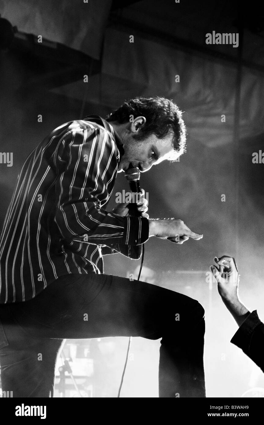 Rock singer at live concert Stock Photo - Alamy