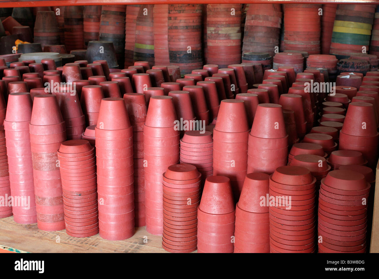 Flower pot warehouse Stock Photo - Alamy