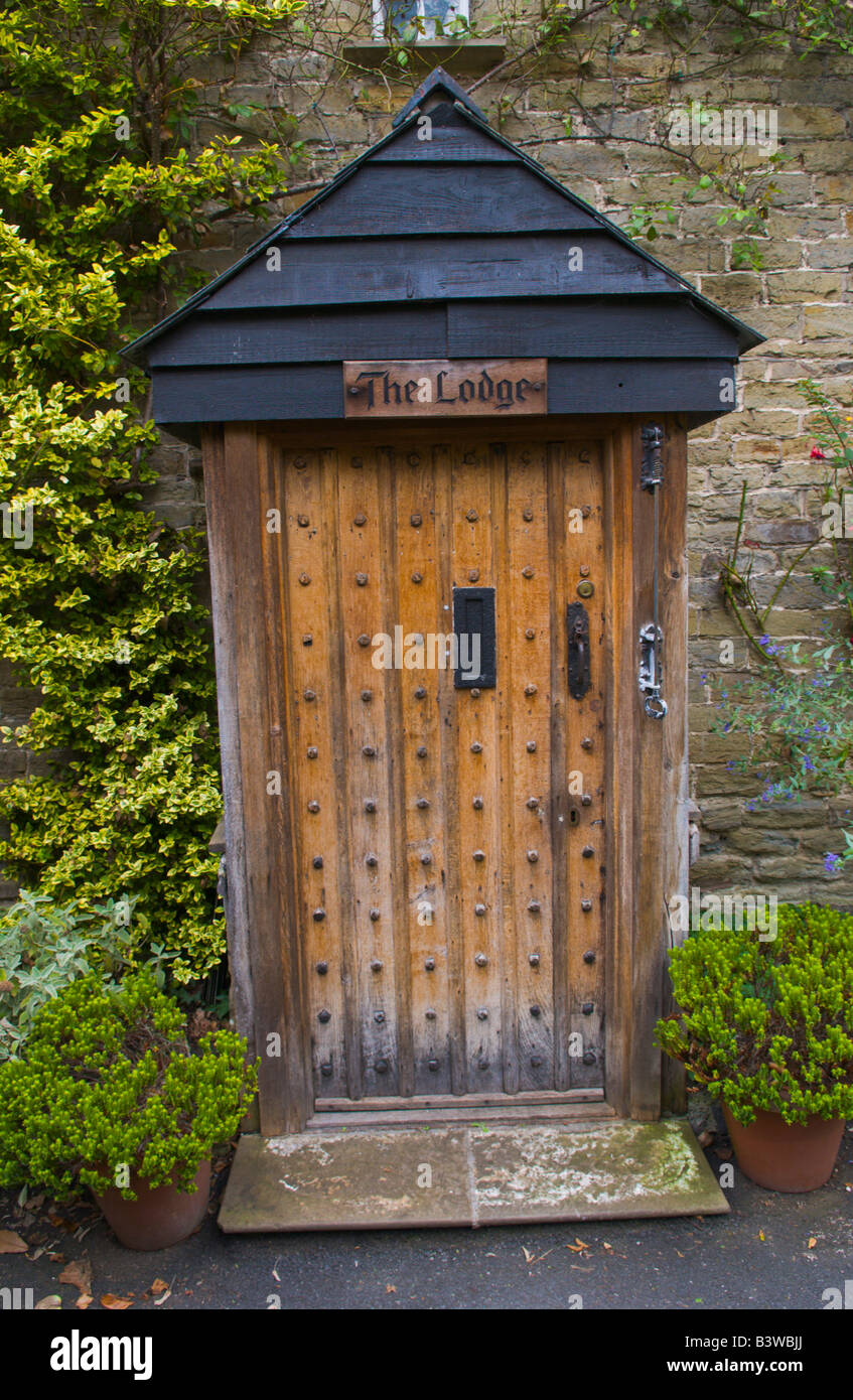 Studded rustic front door with porch on cottage in Ludlow Shropshire ...
