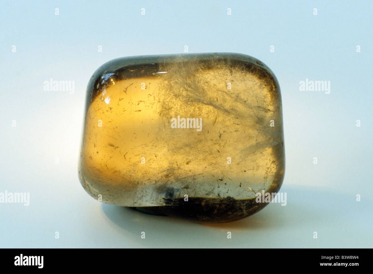 Smoky Quartz, Silicon Oxide (SiO2), polished, studio picture Stock ...