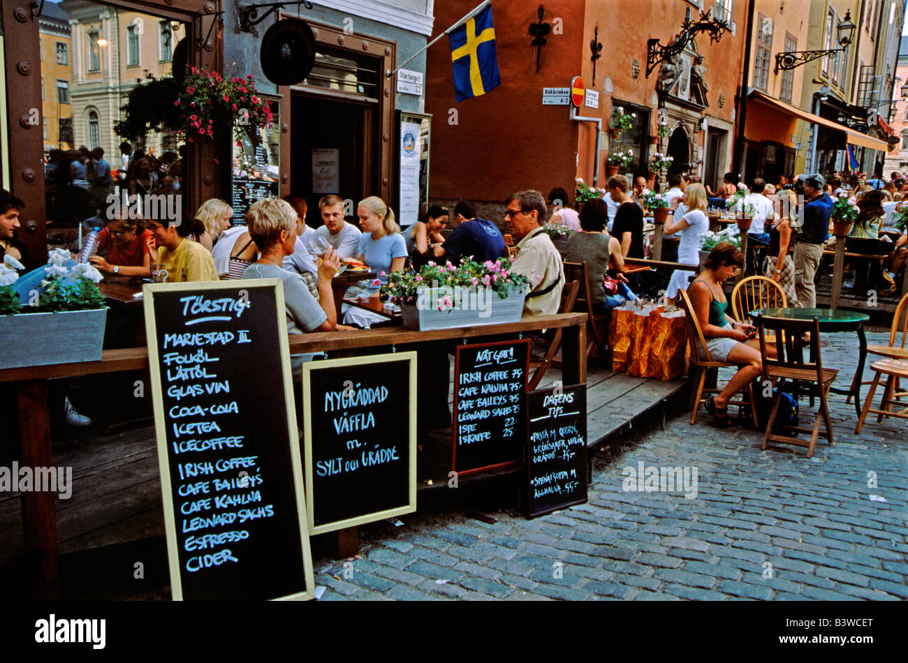 Europe, Sweden, Stockholm. Gamla Stan (aka Old Town), street cafe in ...