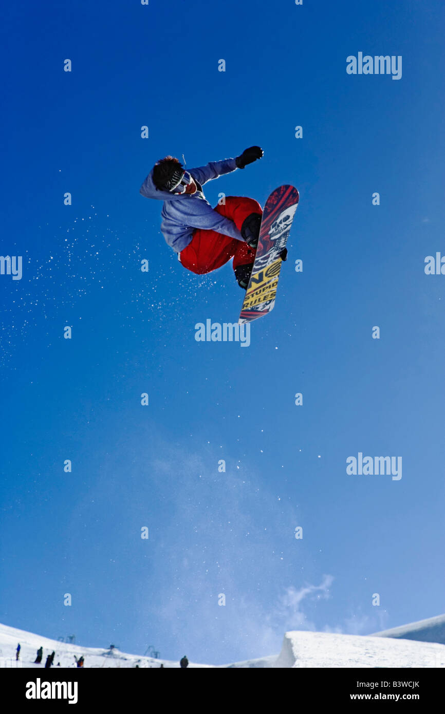 Snowboarder jumping in halfpipe, Klein Matterhorn, Zermatt, Switzerland ...