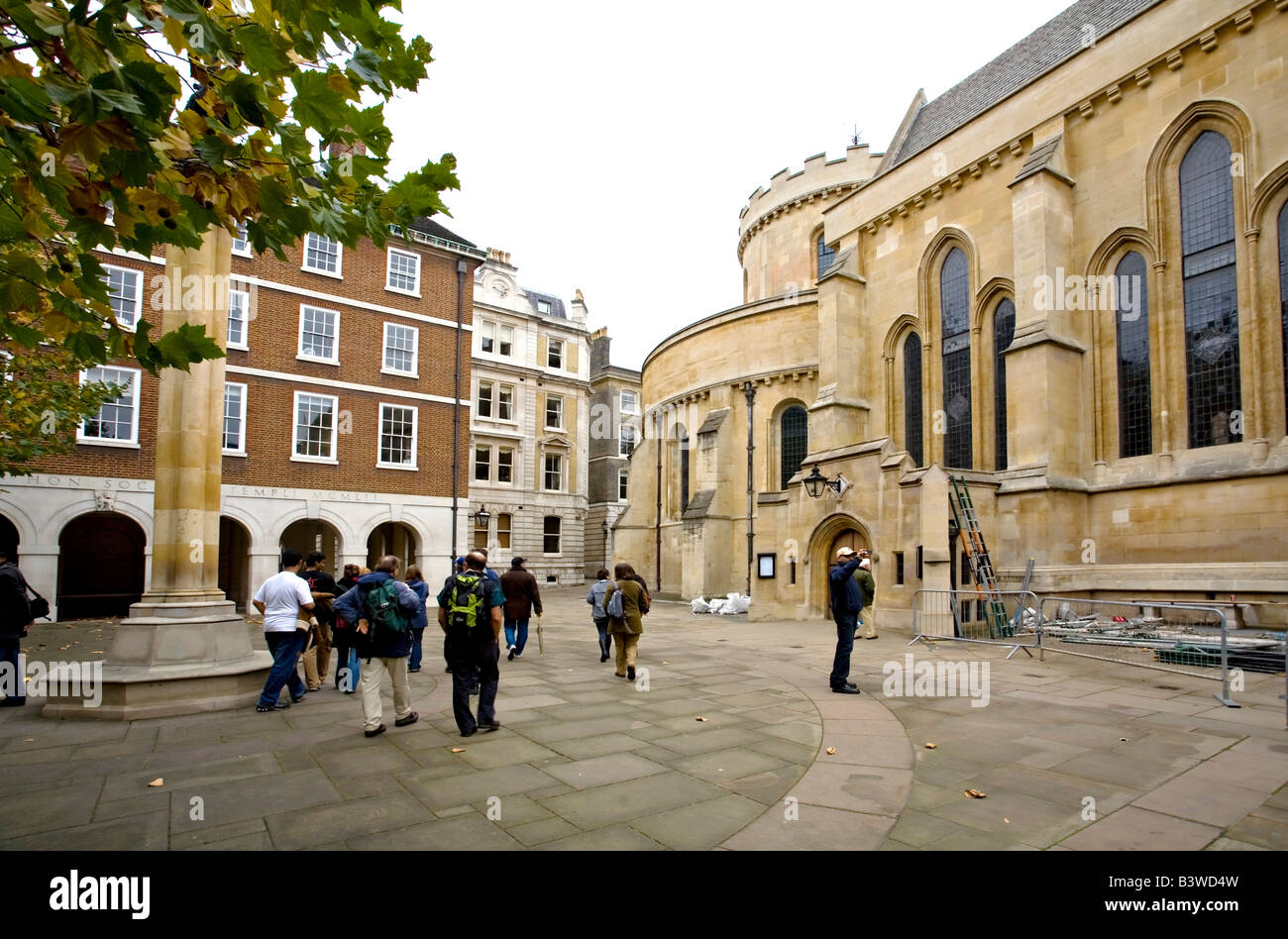UK, London. Tourists visiting Temple Church as featured in the Da Vinci ...
