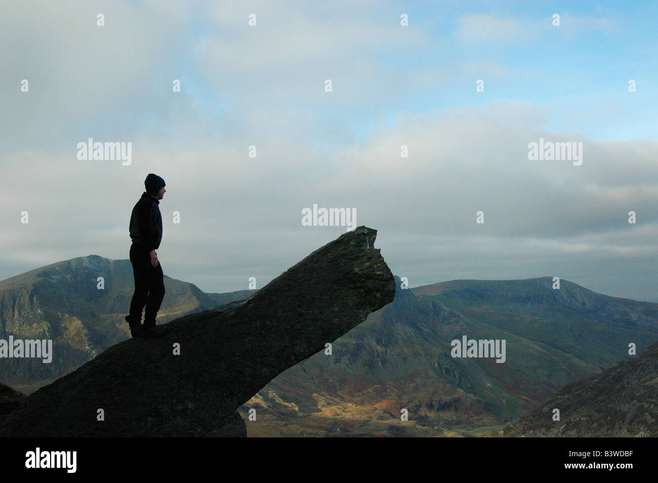 UK - Wales - Snowdonia - Hikers on balanced rock, Tryfan, MR Stock ...