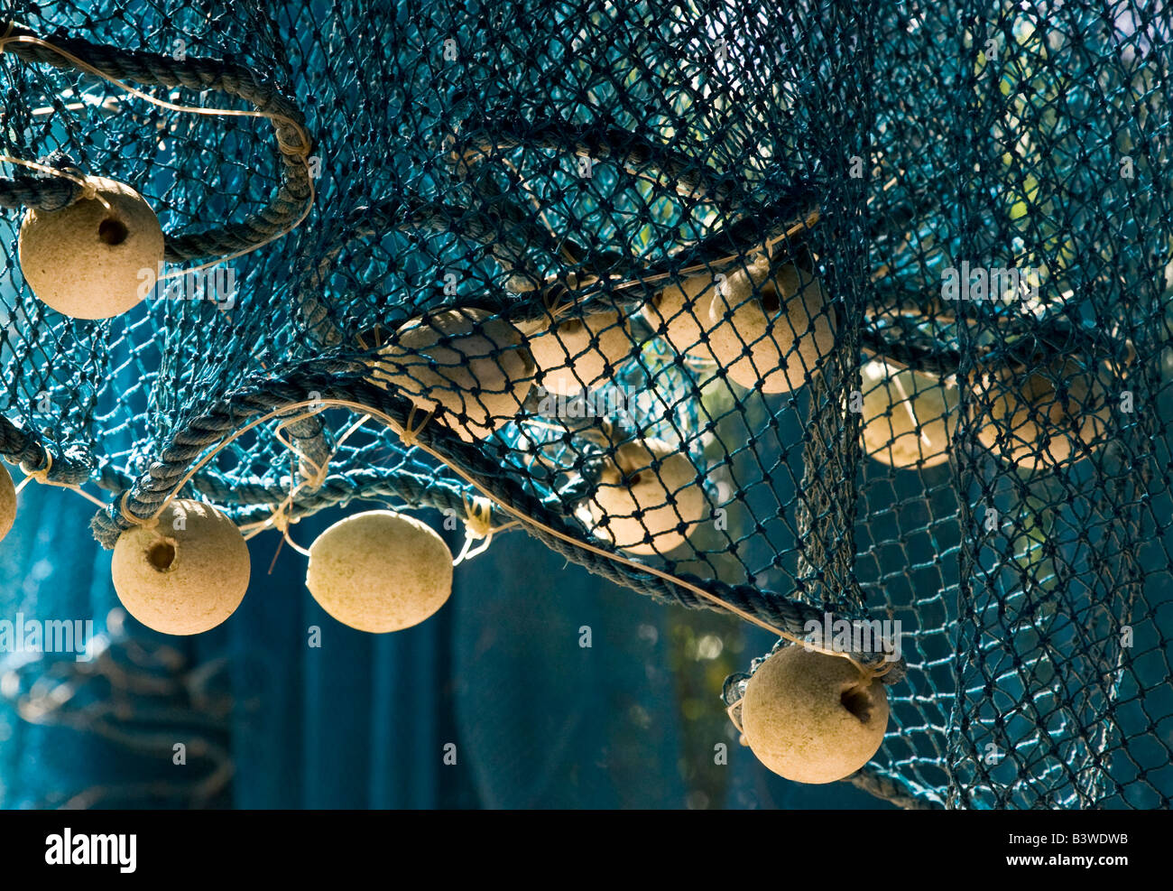 Oceania, French Polynesia, Moorea. Detailed view of fishing nets and ...