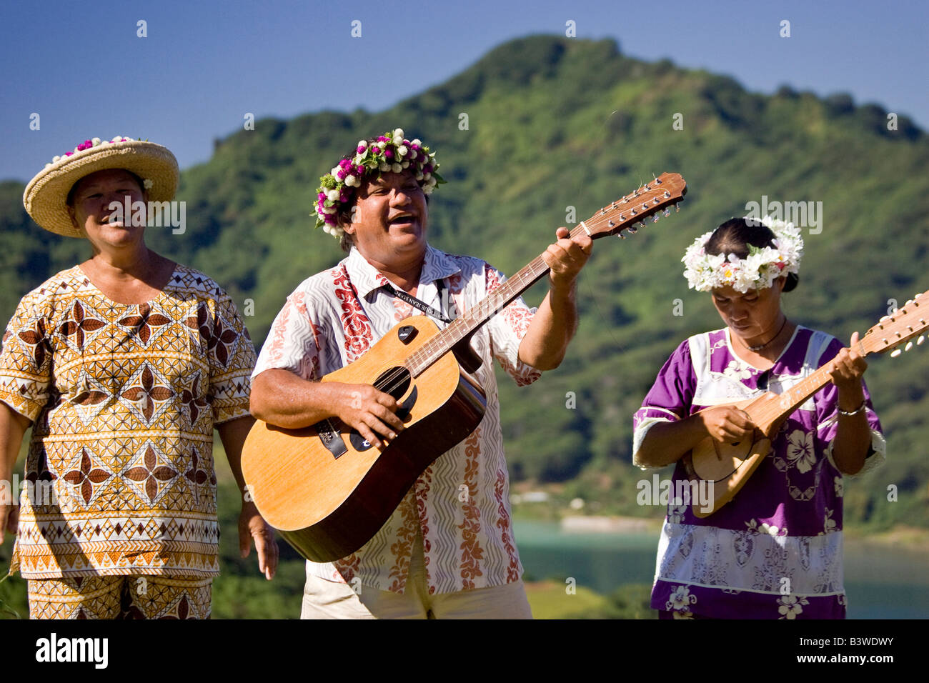 Oceania, French Polynesia, Taha'a. Native musicians playing and singing ...