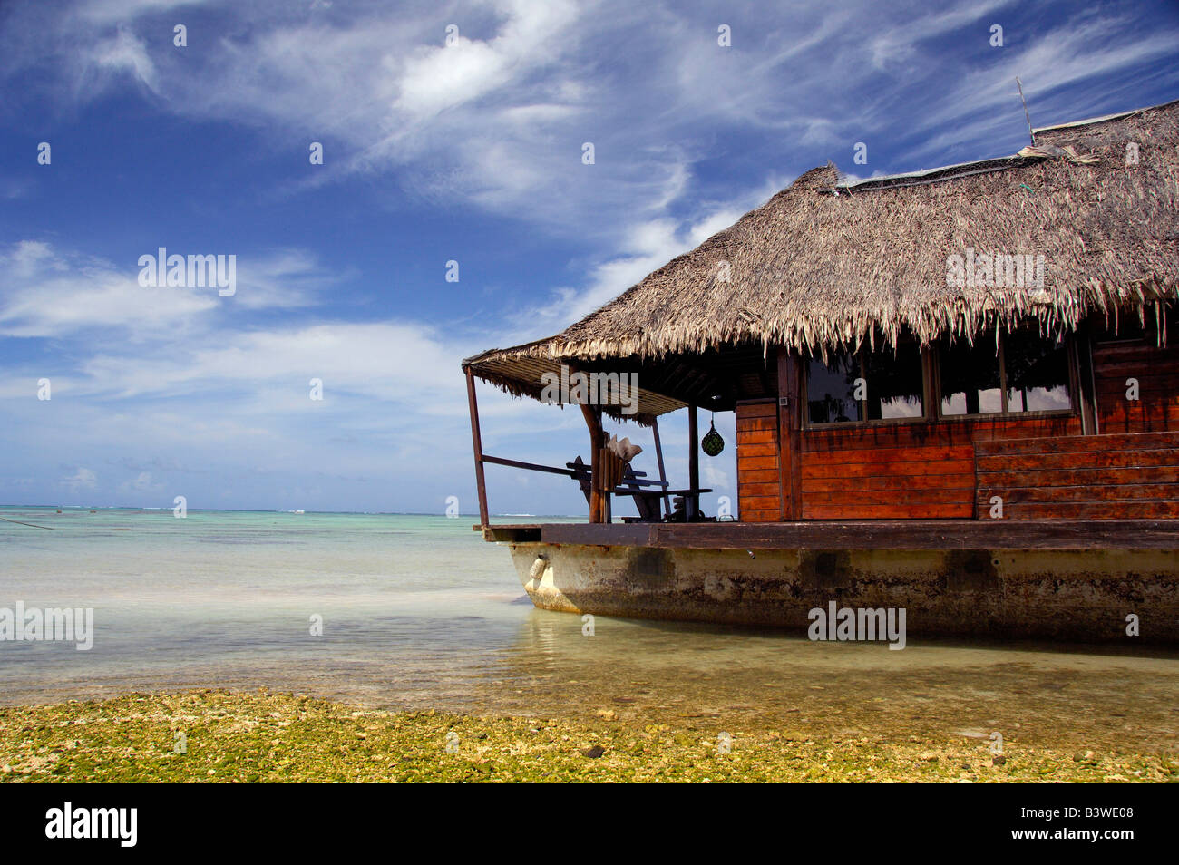 South Pacific, French Polynesia, Moorea. Polynesian style house boat ...