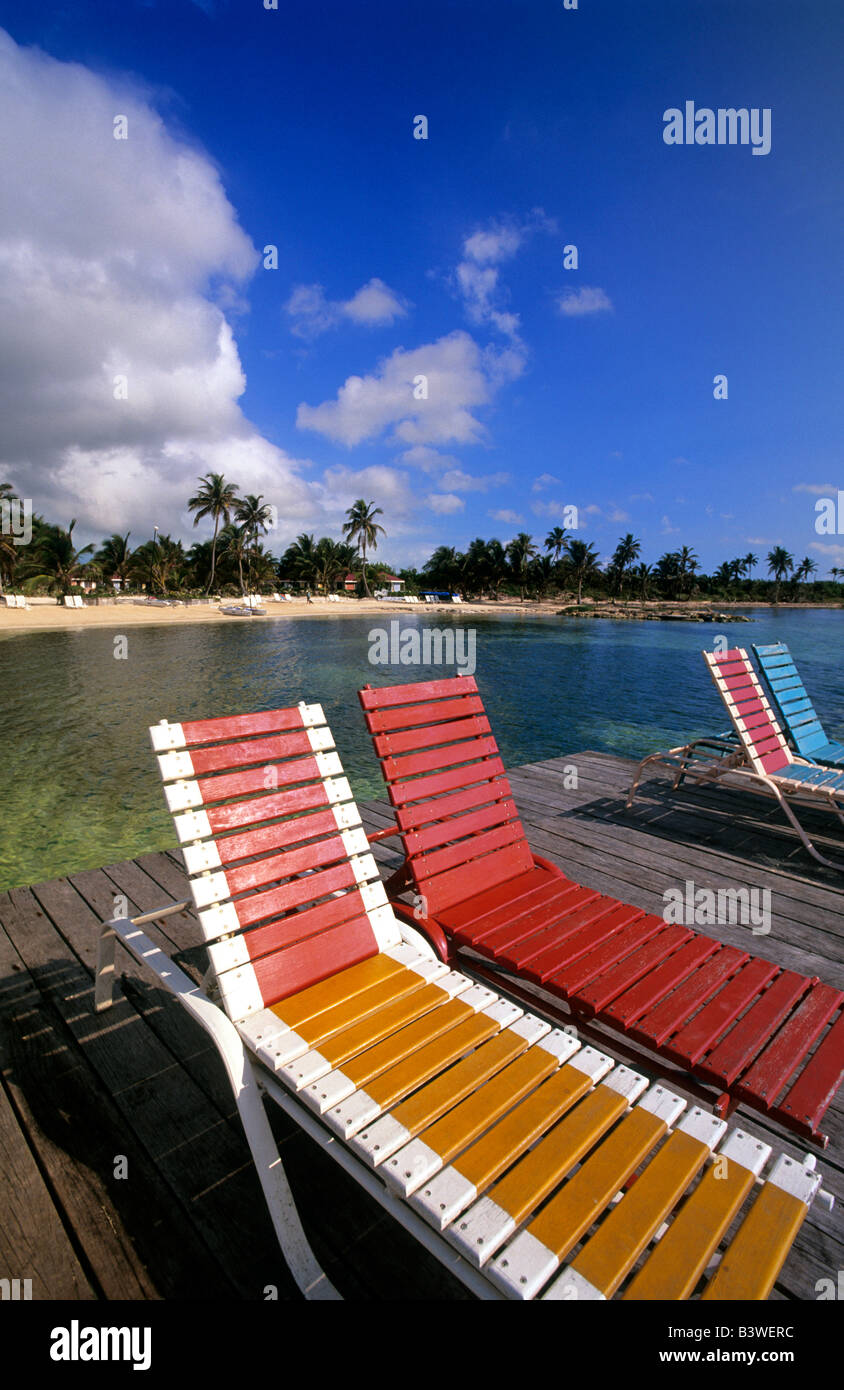 Deck chairs Ambergris Caye, Belize Stock Photo - Alamy