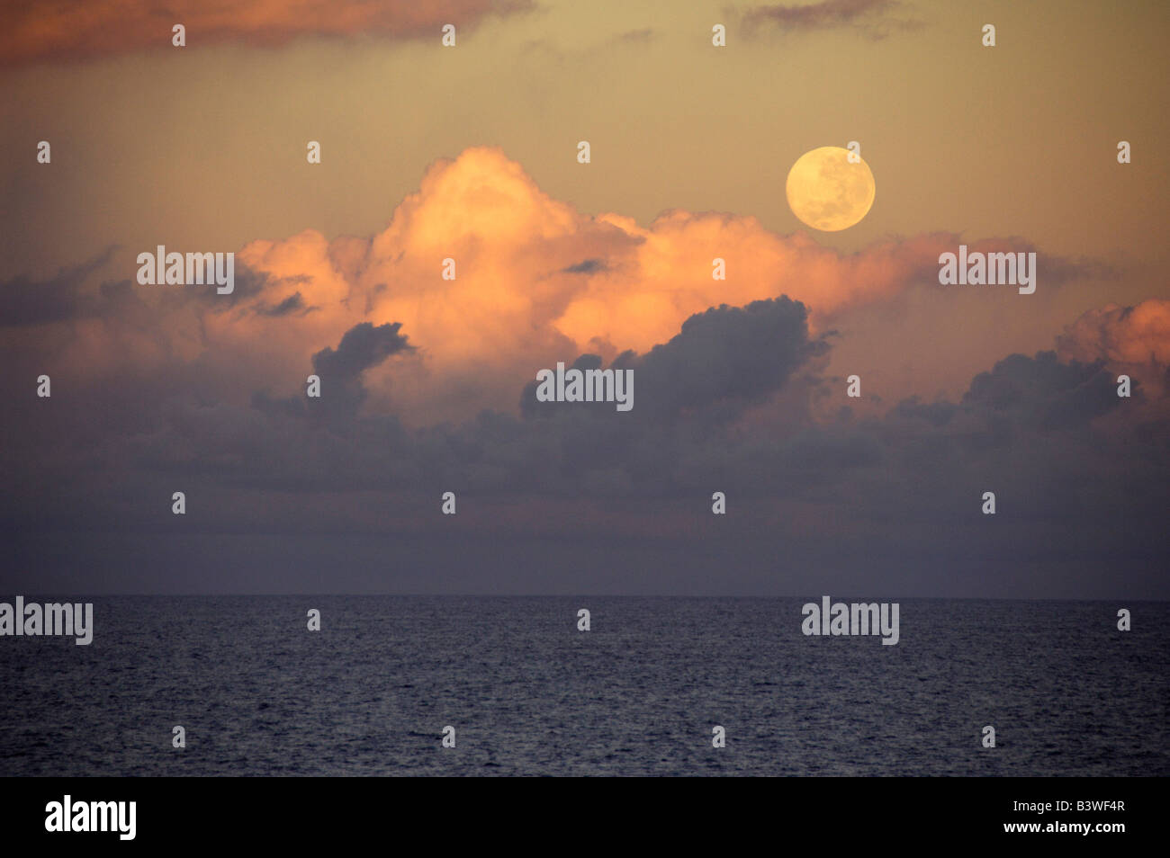 Chile, Easter Island (aka Rapa Nui). Full moon over the South Pacific ...