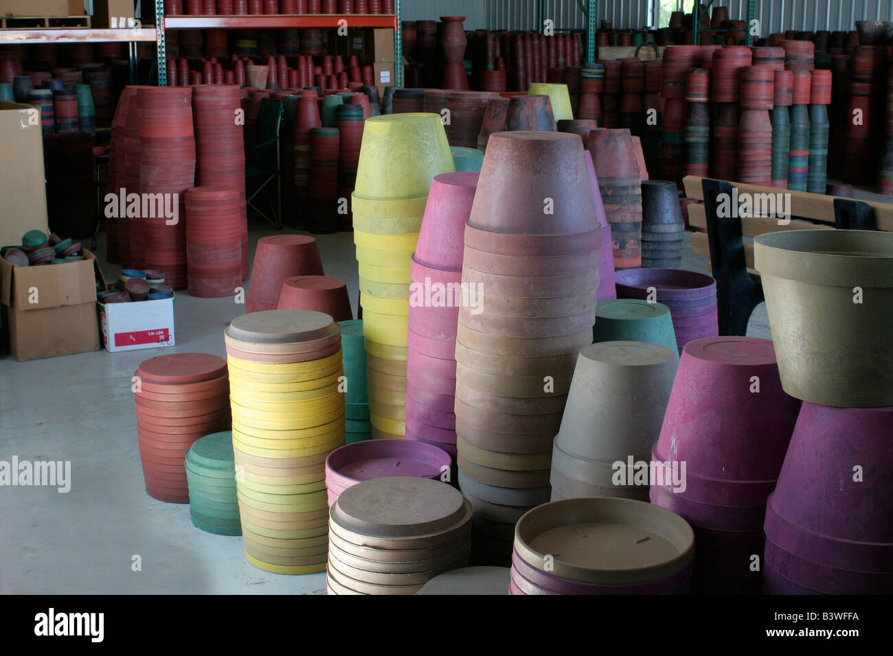 Flower pot warehouse Stock Photo - Alamy