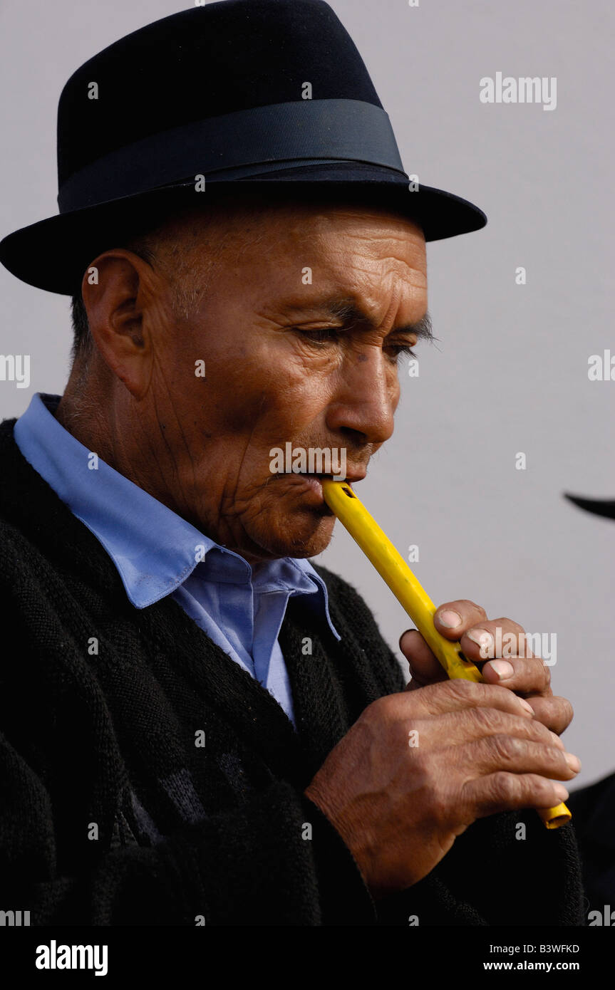Piper playing vulture bone flute during the Good Friday celebrations ...