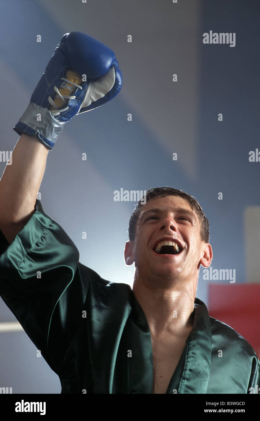 Winning Boxer celebrated his victory Stock Photo - Alamy