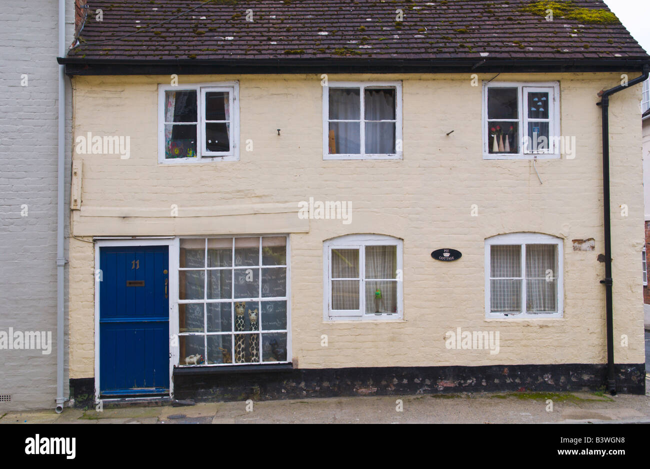 Blue front door of terraced cottage in Ludlow Shropshire England UK ...