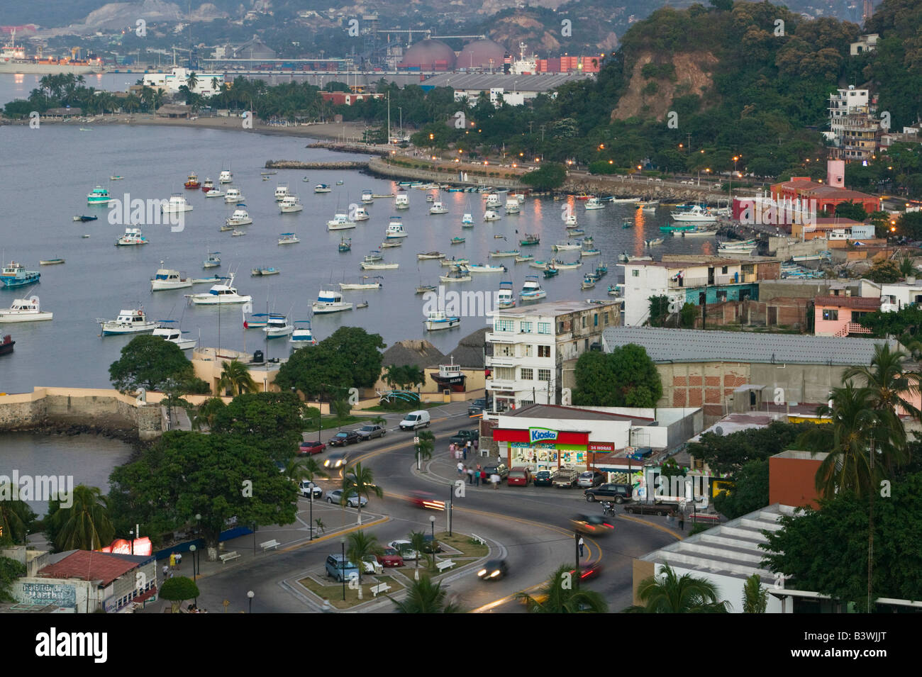Mexico, Colima, Manzanillo. Fishing Port and Town View / Dusk Stock ...