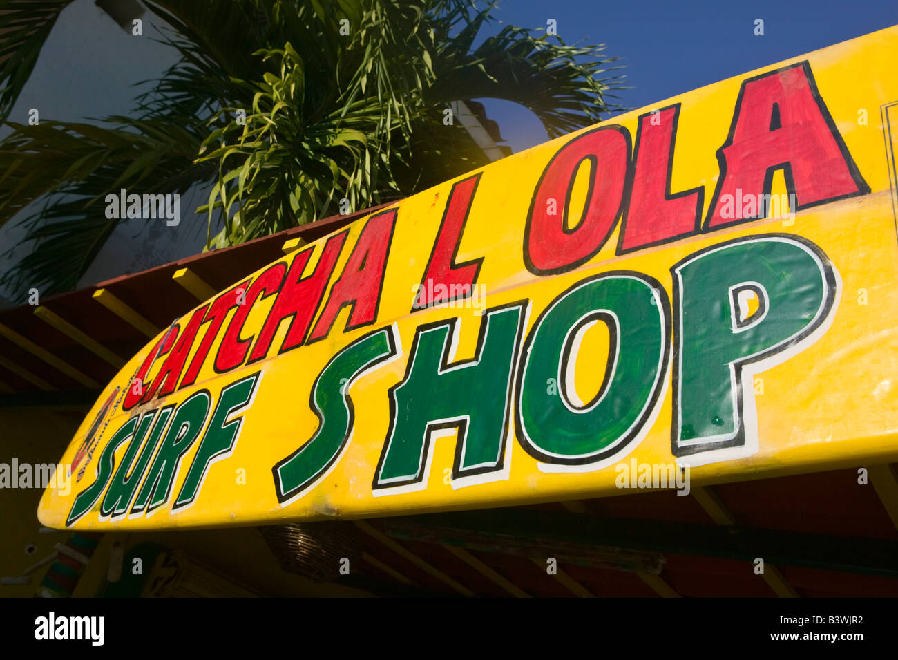 Mexico, Guerrero, Ixtapa. Catcha La Ola Surf Shop Sign Stock Photo - Alamy