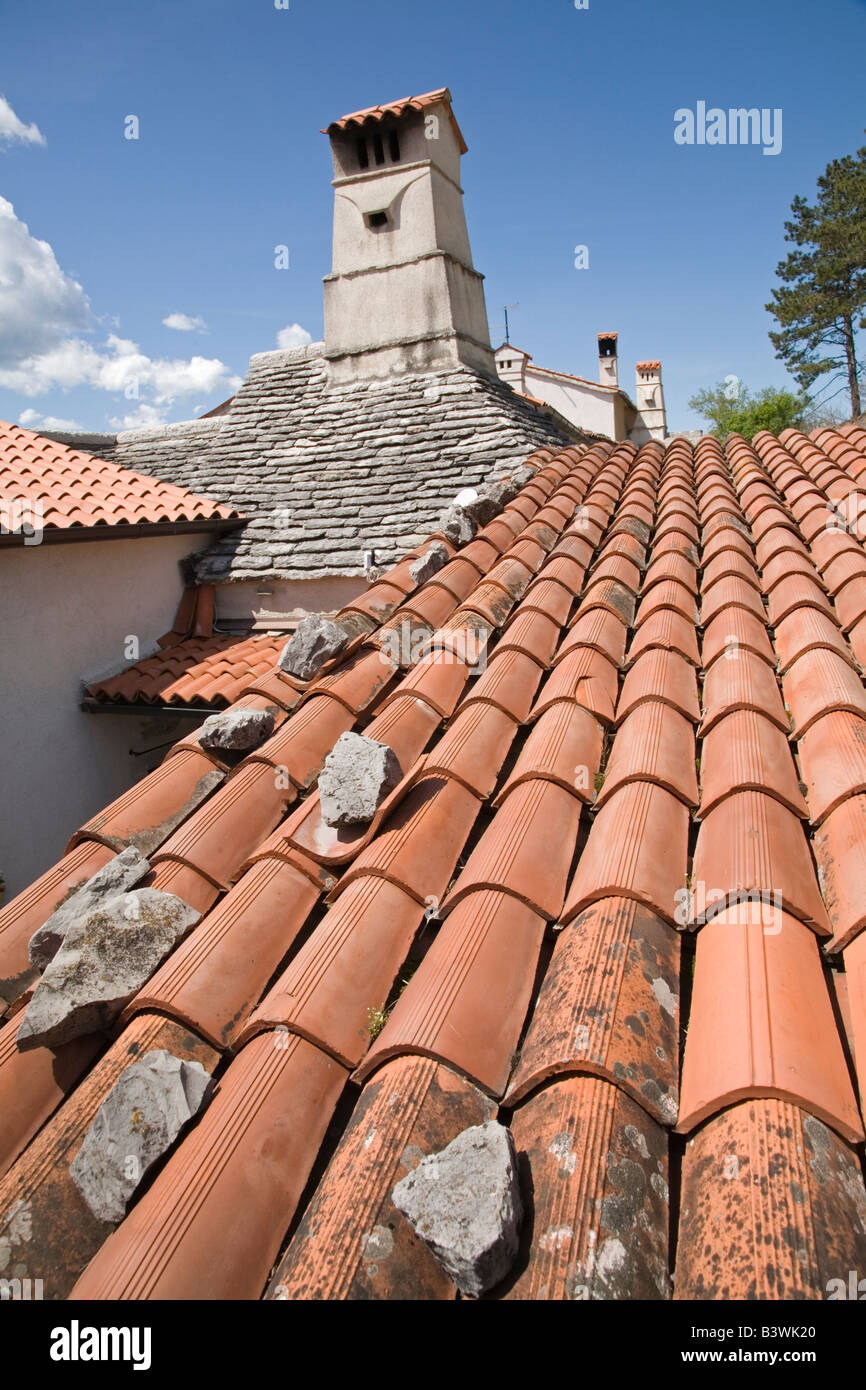 Typical red tiled roofs with limetone chimney and limestone blocks to ...
