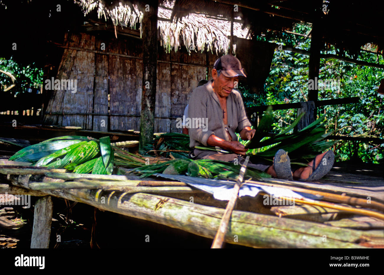 South America, Peru, Amazon River. Roof thatcher Stock Photo - Alamy