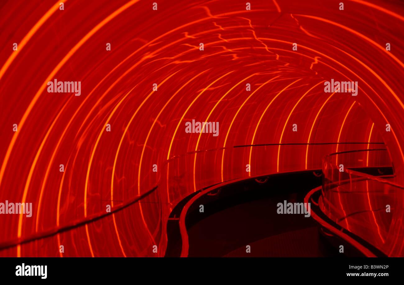Red neon winding tunnel style corridor Stock Photo - Alamy