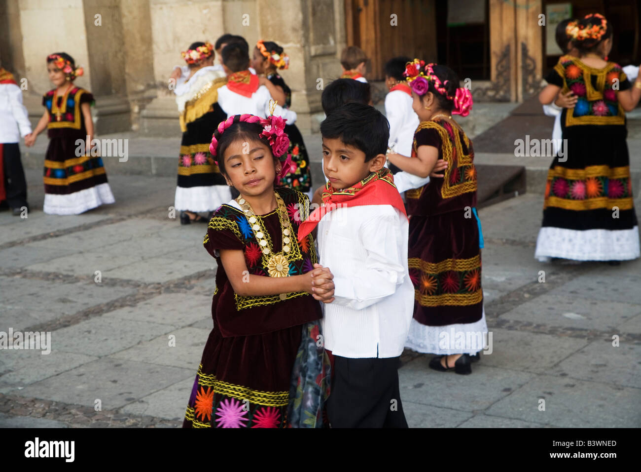 Tehuana children are dressed up in traditional costumes during Easter ...
