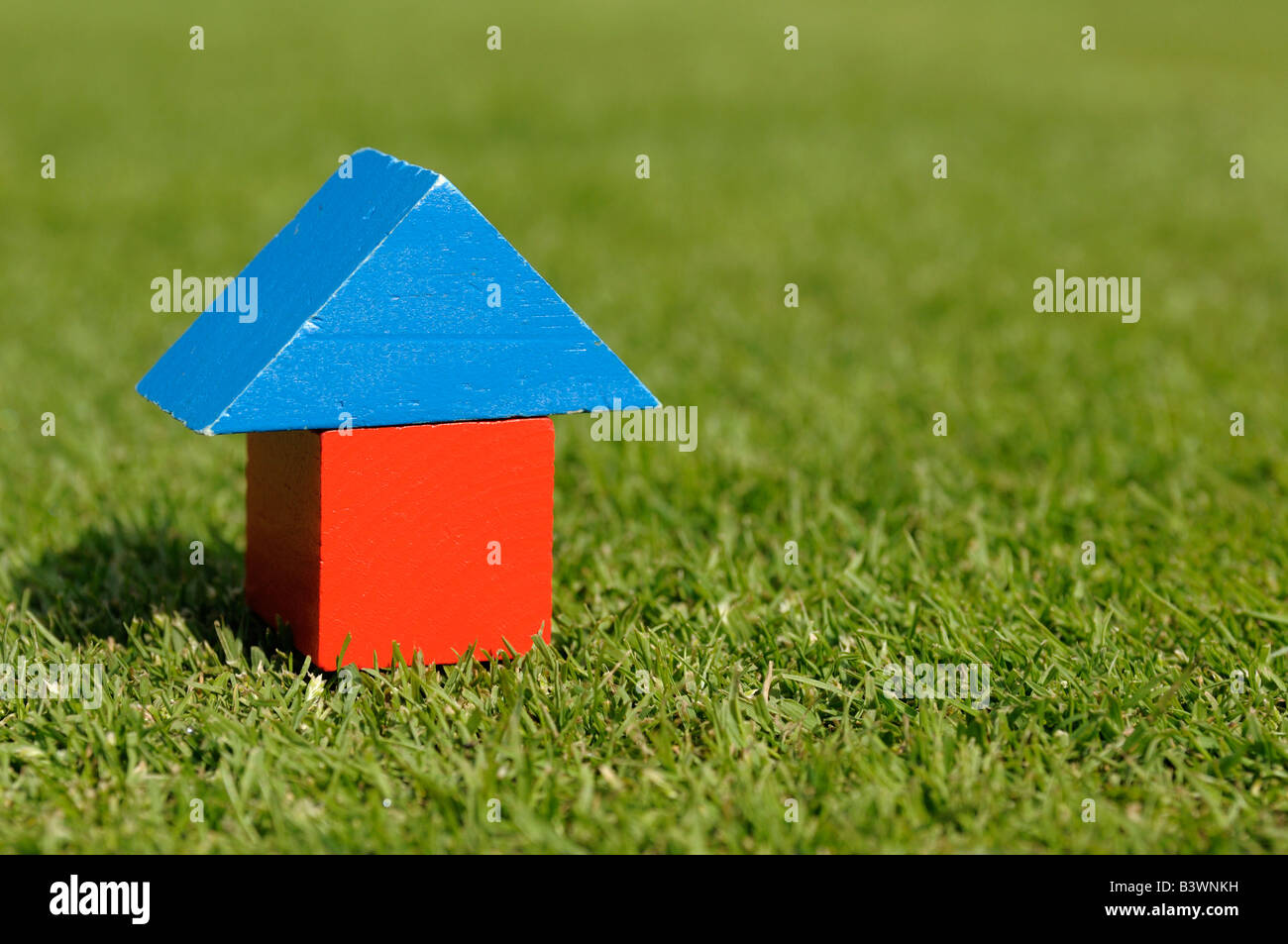 Wooden house shape Stock Photo - Alamy