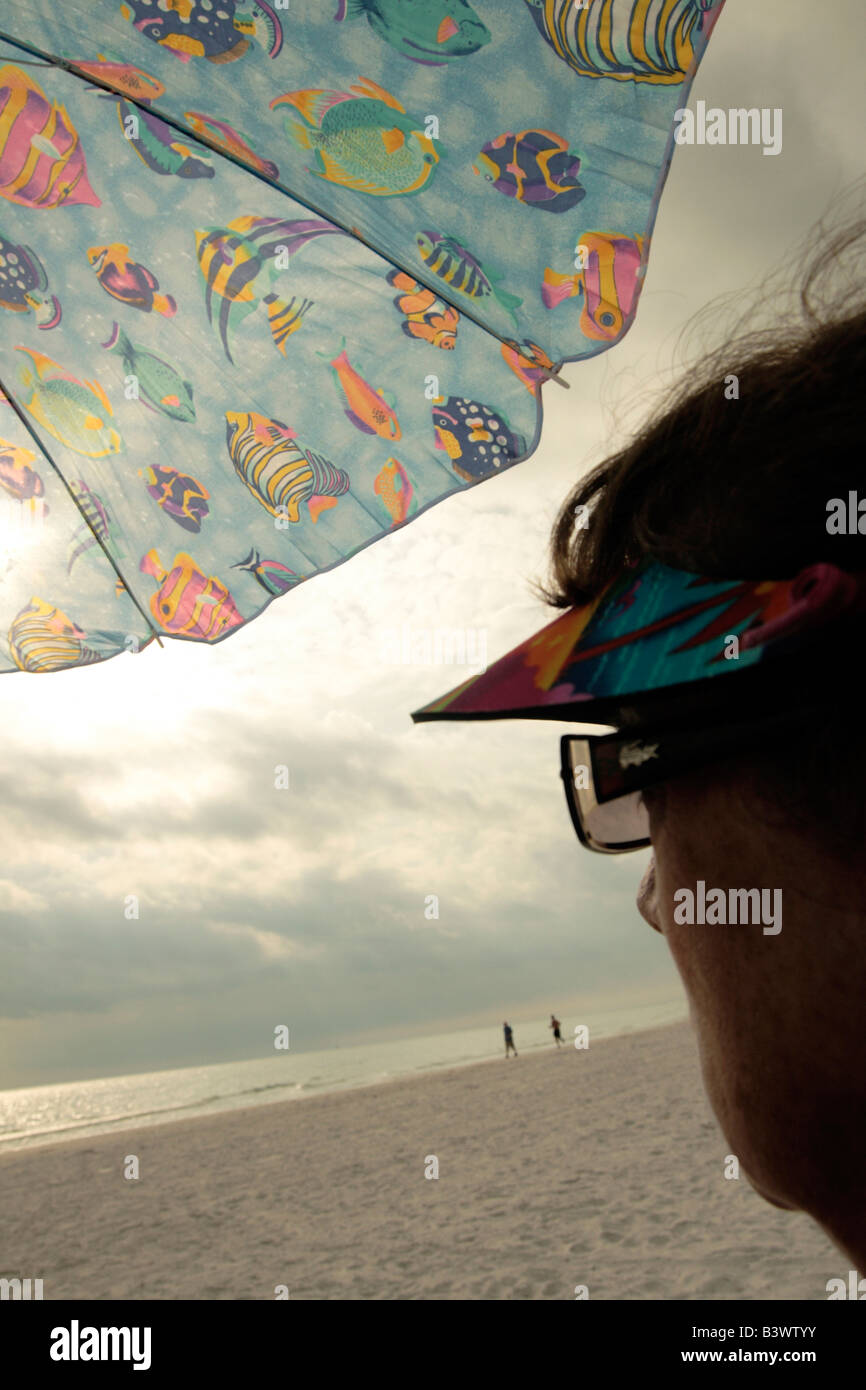 Close-up of a woman on the beach Stock Photo - Alamy