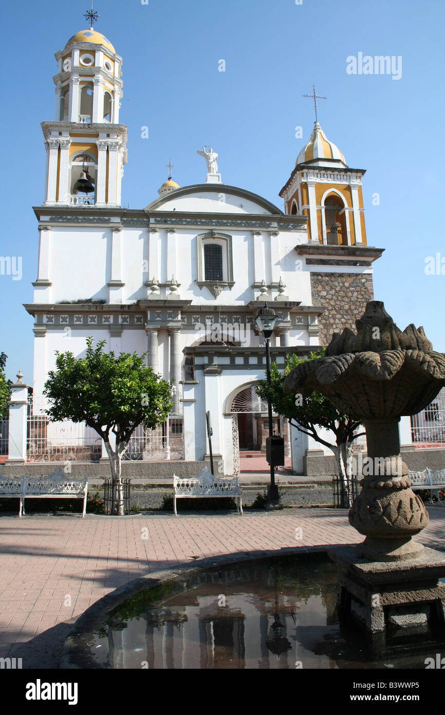 Old catholic cathedral by a park with fountain Stock Photo - Alamy