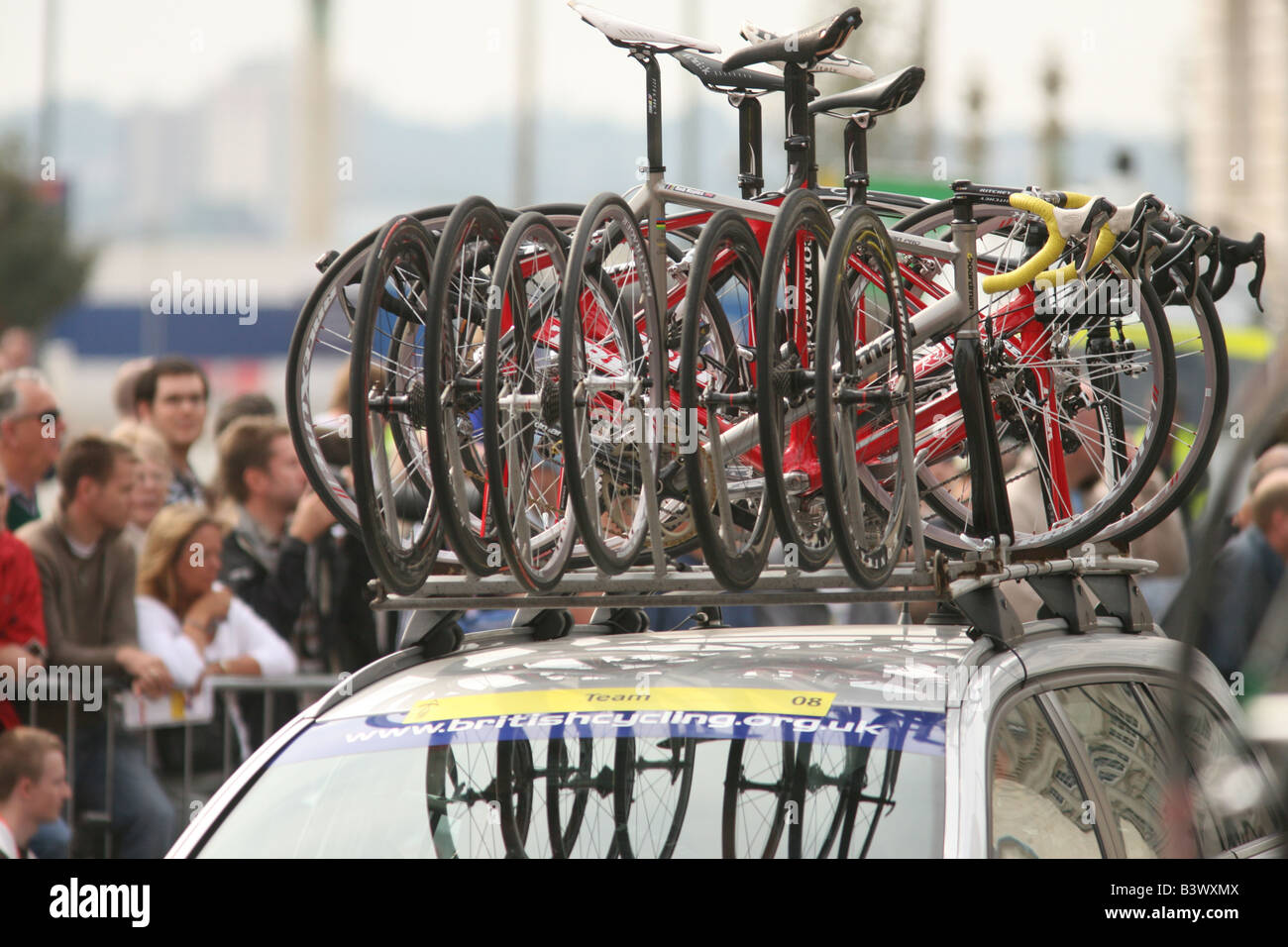 Racing bicycle gear on roof rack of support vehicle Stock Photo - Alamy