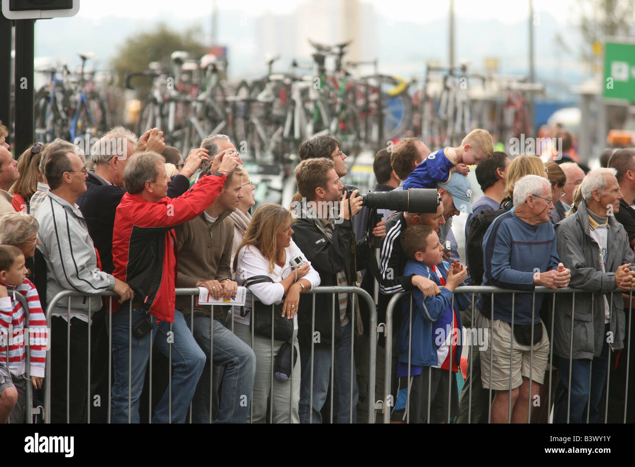 Crowds of spectators watching finish of road race Stock Photo - Alamy