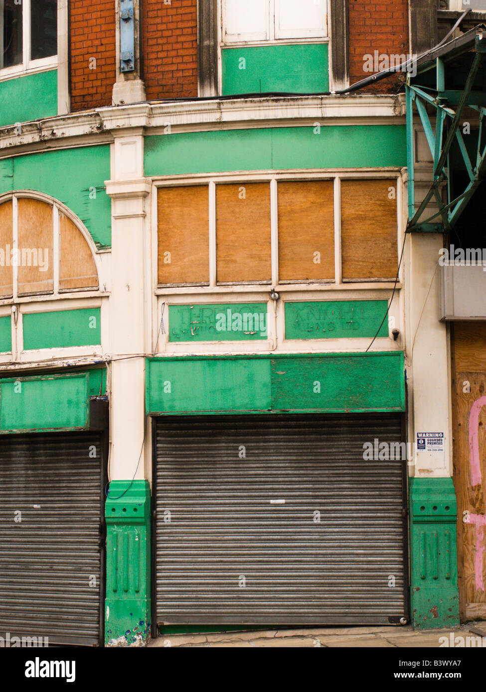 Boarded-up doors and windows at London's Smithfield Market Stock Photo ...