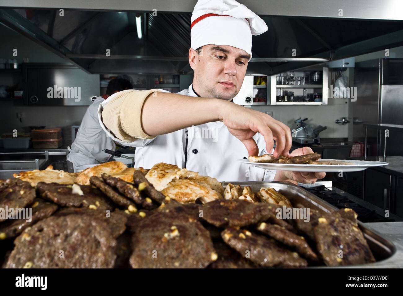 Chef at work Stock Photo - Alamy