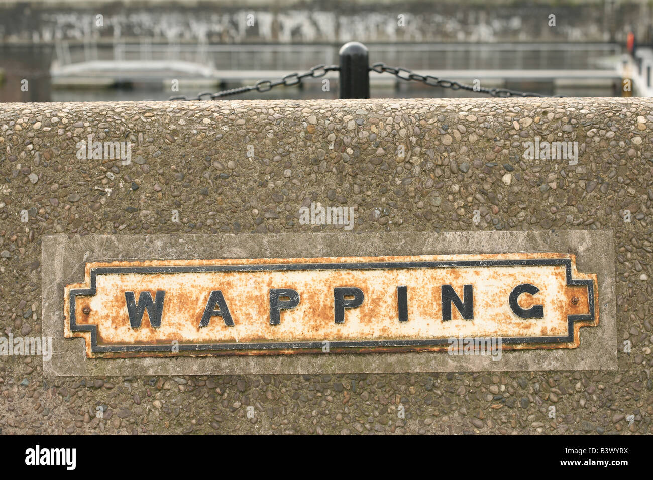 Wapping rusty street sign on dock wall, river Mersey Stock Photo - Alamy