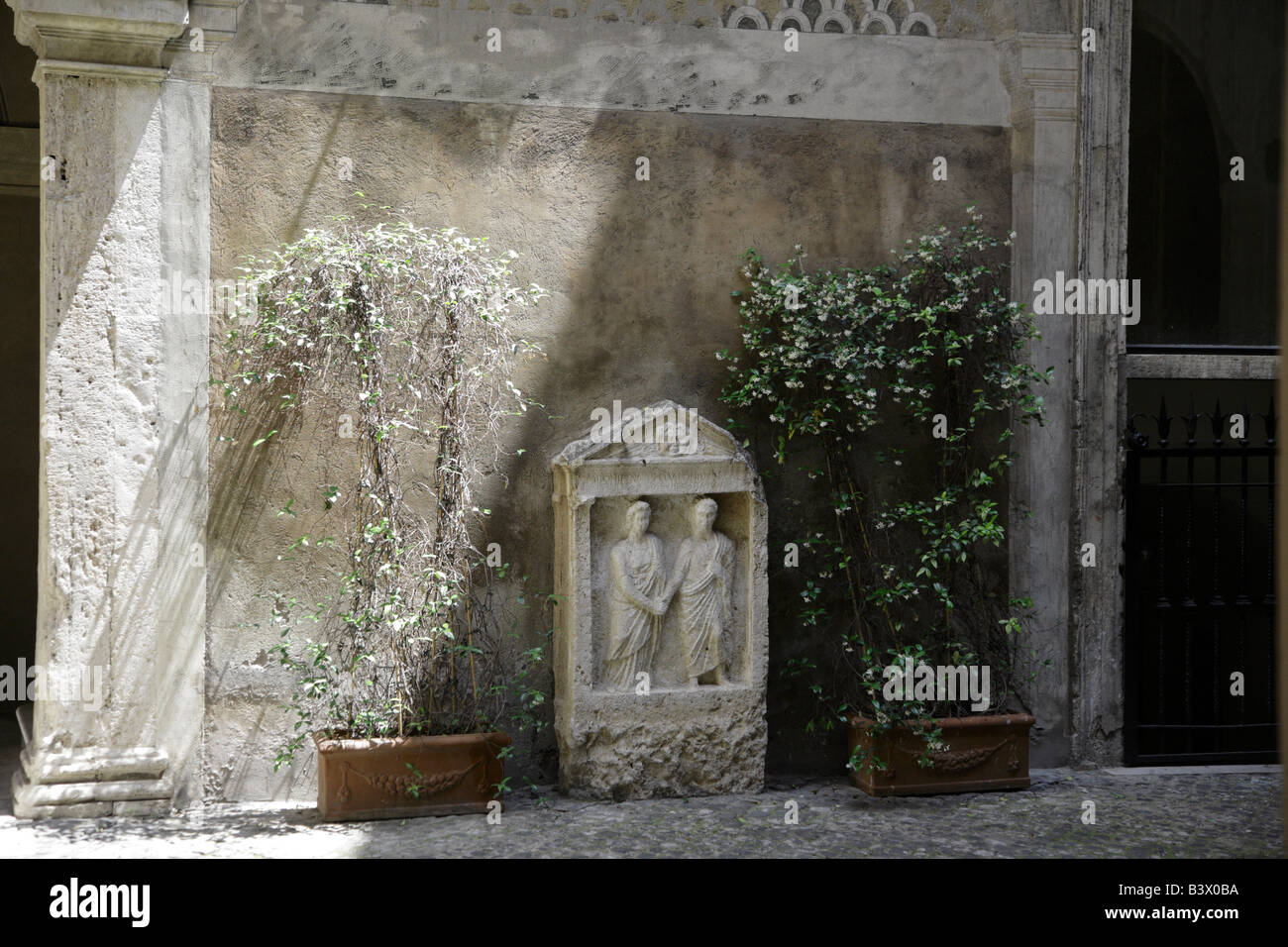 Ancient Roman tombstone in courtyard Stock Photo - Alamy
