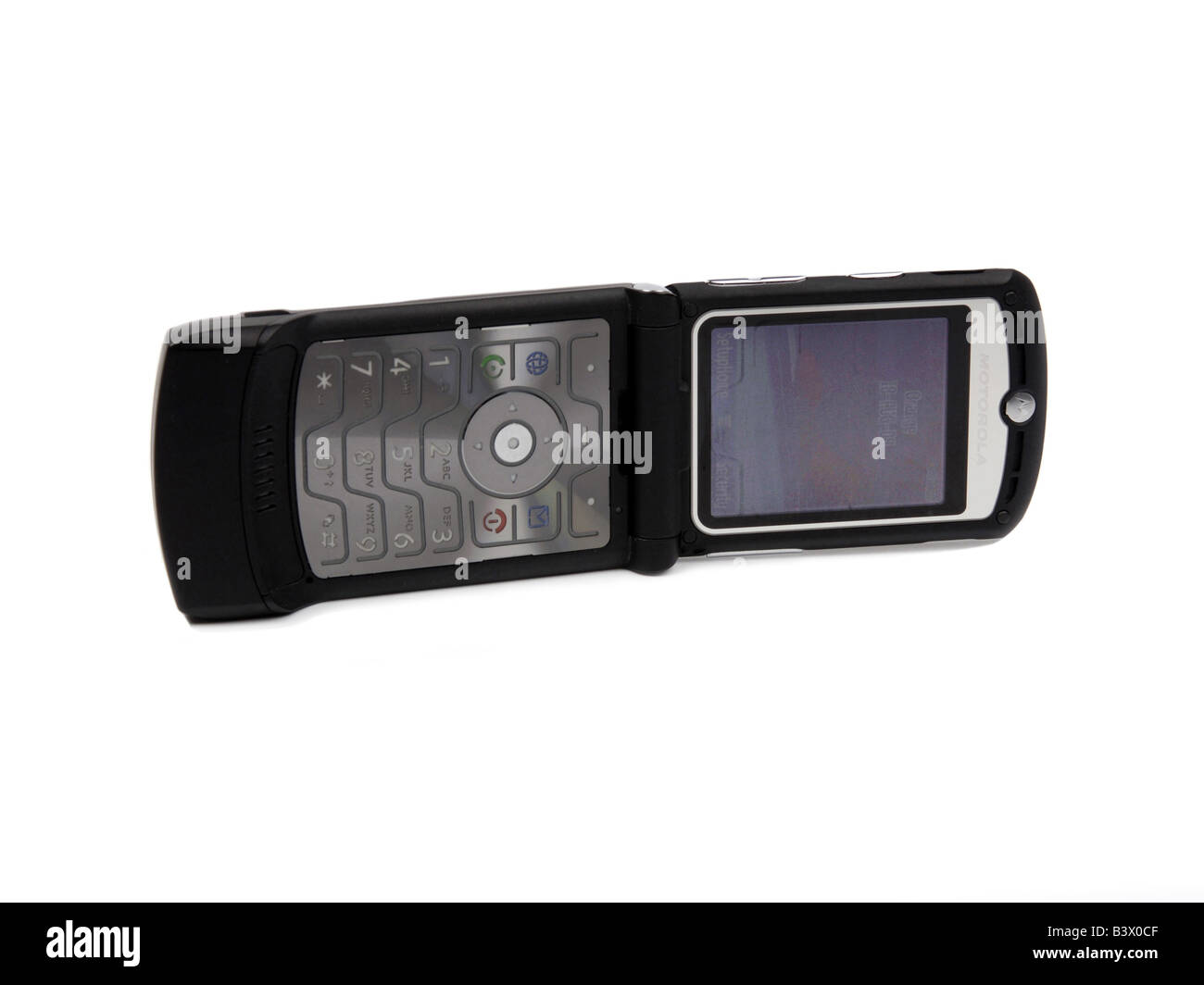 Black Clamshell style flip cell phone against a white background Stock ...