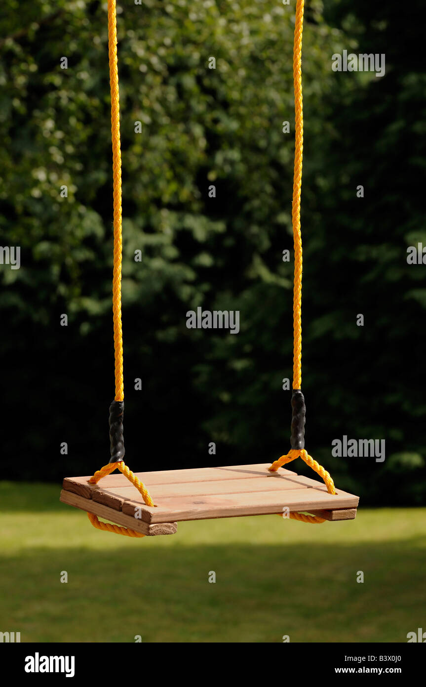 Wooden swing hi-res stock photography and images - Alamy