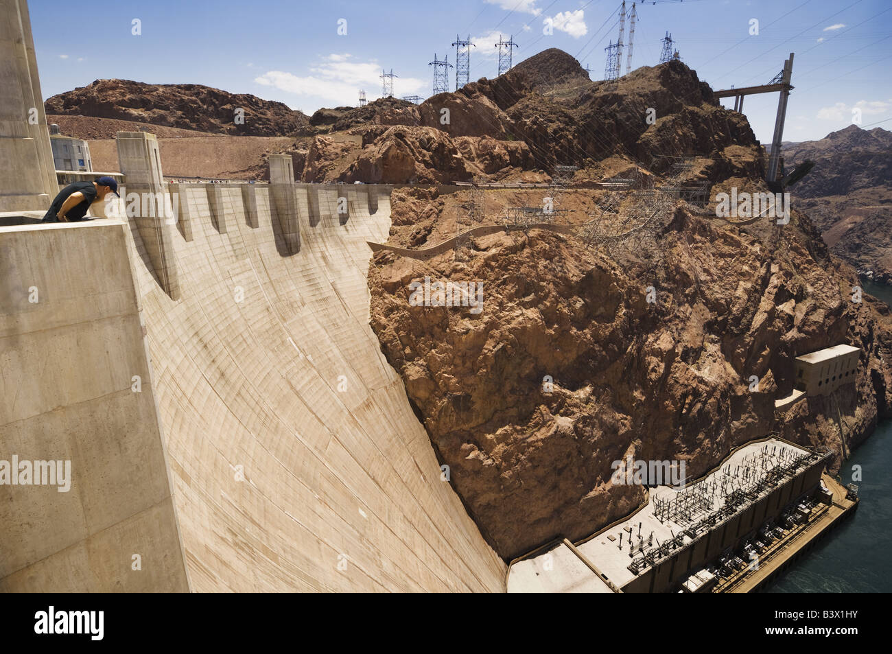 Tourist looking down from The Hoover Dam Stock Photo - Alamy