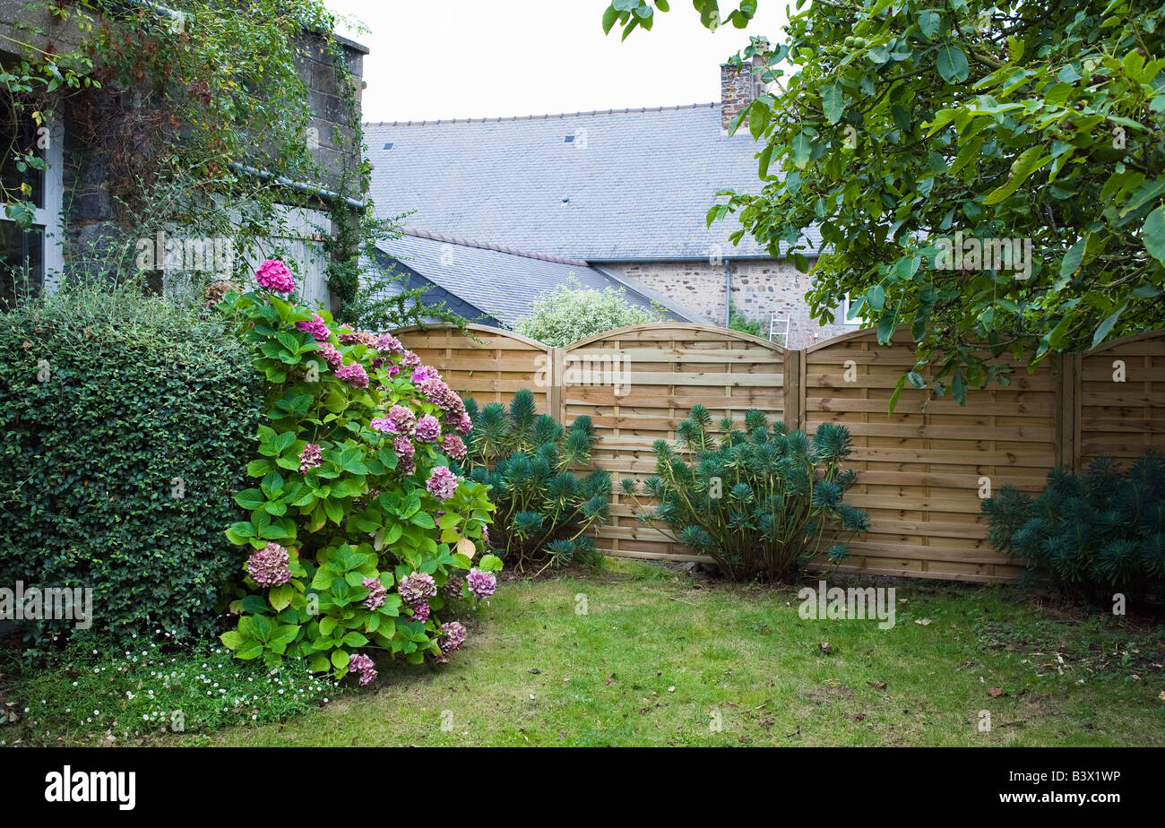 GARDEN AND DIVIDING WOODEN FENCE BRITTANY FRANCE EUROPE Stock Photo - Alamy