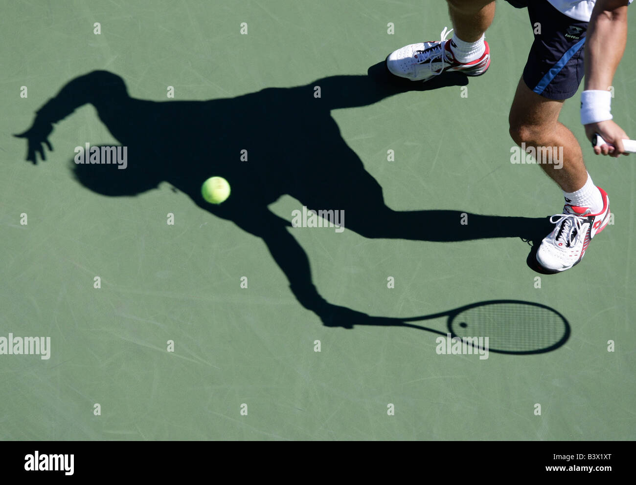 Shadow of a tennis player in action at the US Open Stock Photo - Alamy