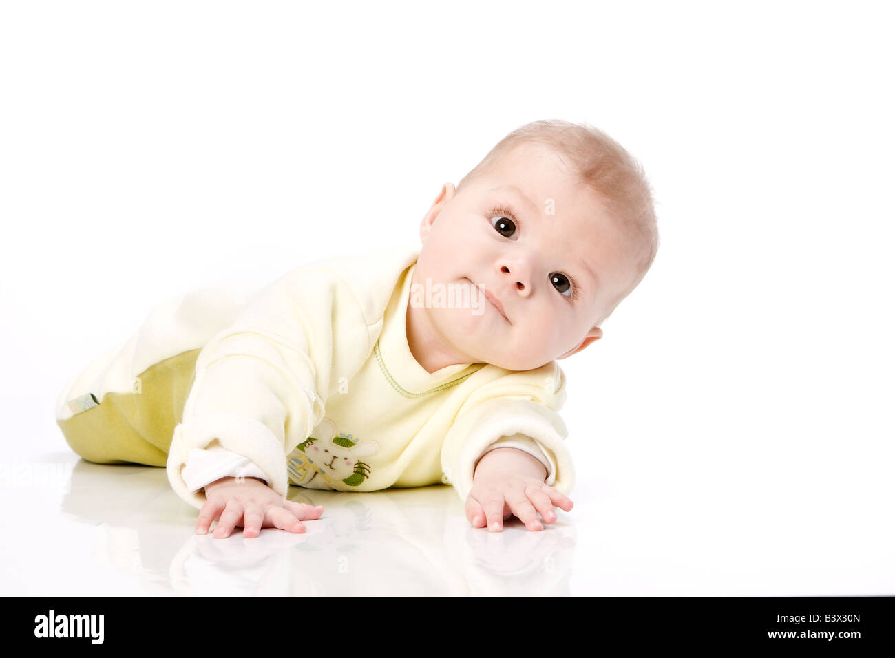 Laying baby happy facial expression Stock Photo - Alamy