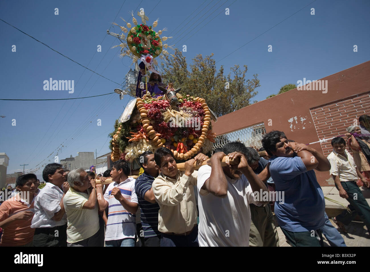 Men carry a statue of Christ during Palm Sunday Easter Procession in ...