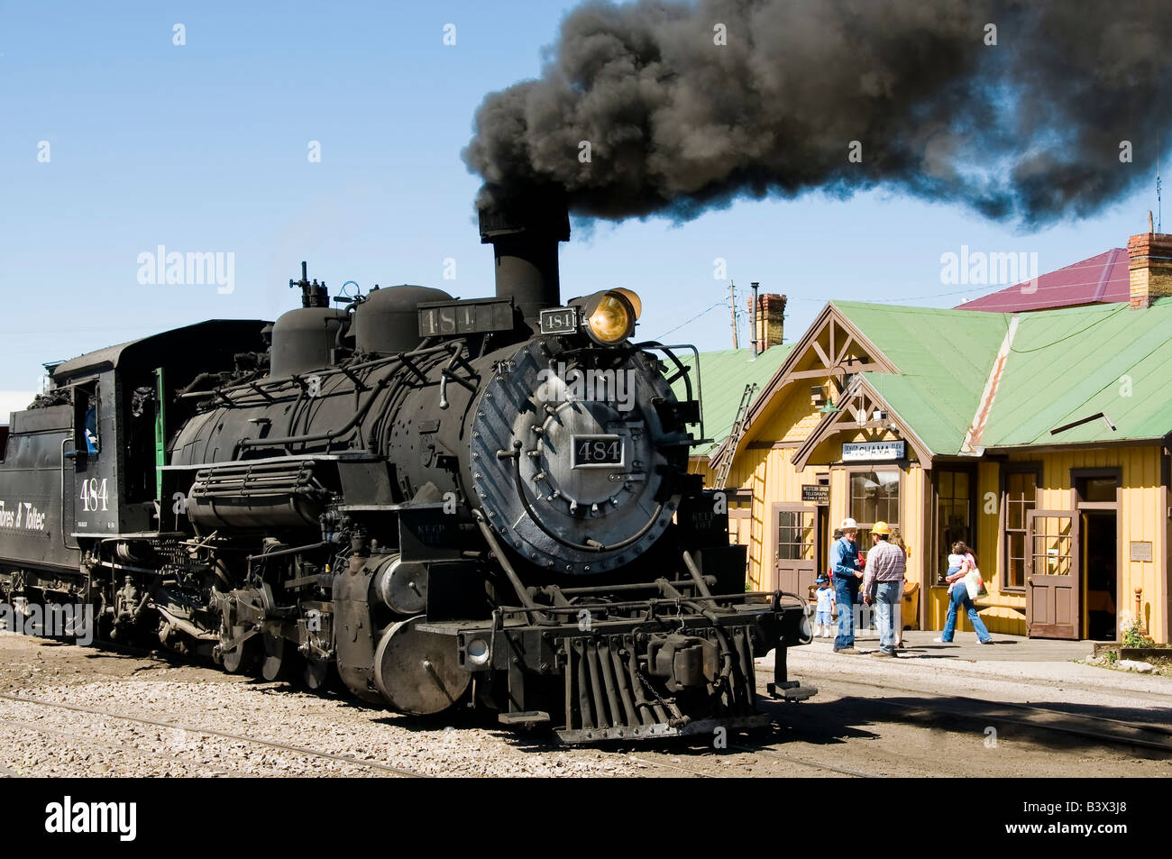 Old fashioned vintage locomotive train engine moving on tracks Stock ...