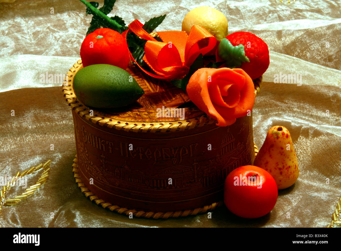 Rose shaped marcipan.and a circle cyrillik alphabet signed box from St ...