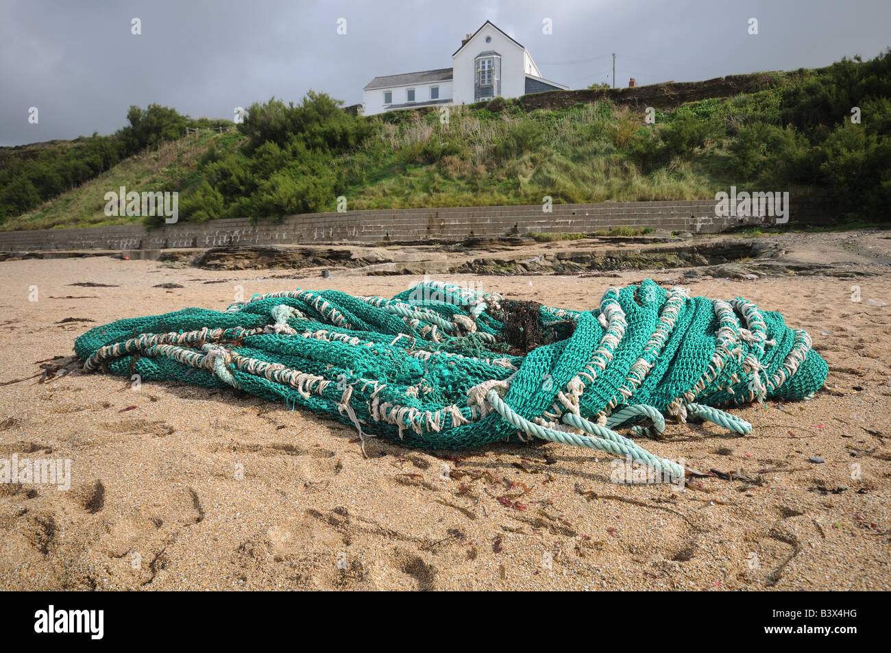 fishing net washed ashore Gunwalloe Beach Cornwall england uk Stock ...