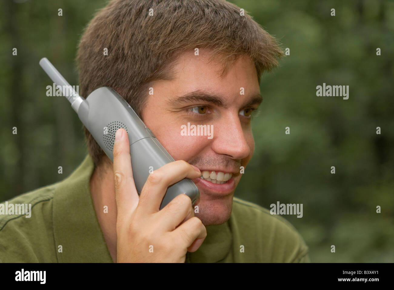 young man talking on the phone Stock Photo - Alamy