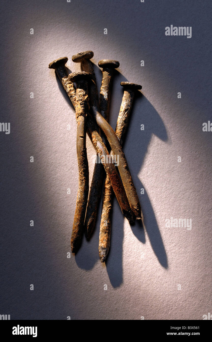 Five old nails Stock Photo - Alamy